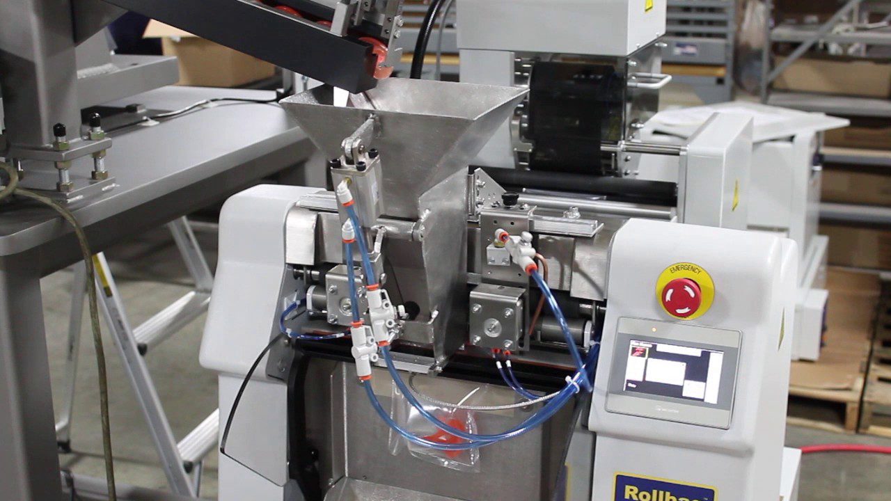 Automatic Bagger for Injection Molded Parts - Packing Pacifiers - PAC ...